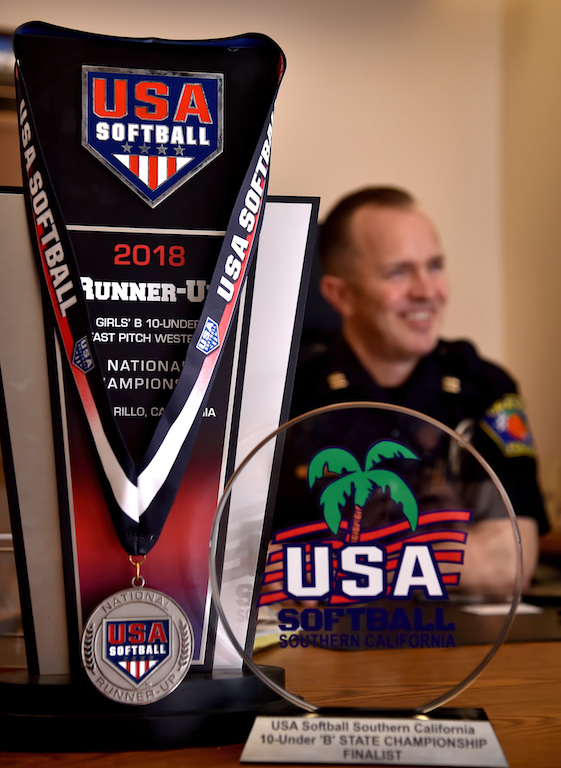 Orange PD captain wears other hat, takes girls softball team to ...