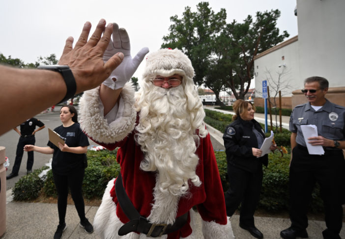 Tustin Police Department’s Santa Cop event brings joy to local families ...