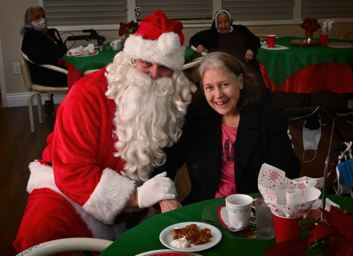 Seniors receive hot meals and a side of good cheer at Saint Francis ...