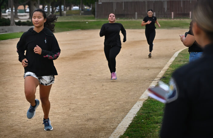 Female recruits get a leg up on physical agility test during Santa Ana ...
